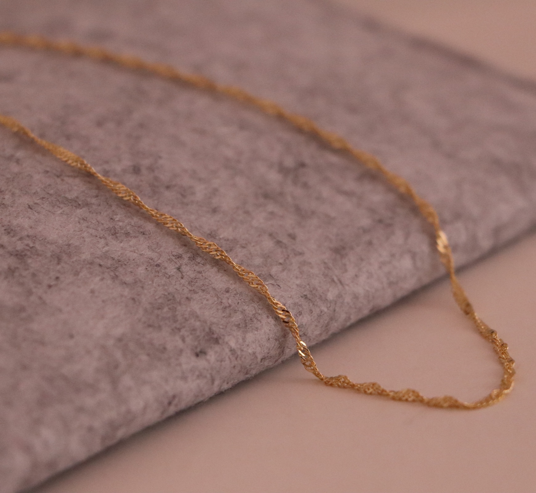CADENA TEJIDO SINGAPUR ALARGADA ORO LAMINADO 18K